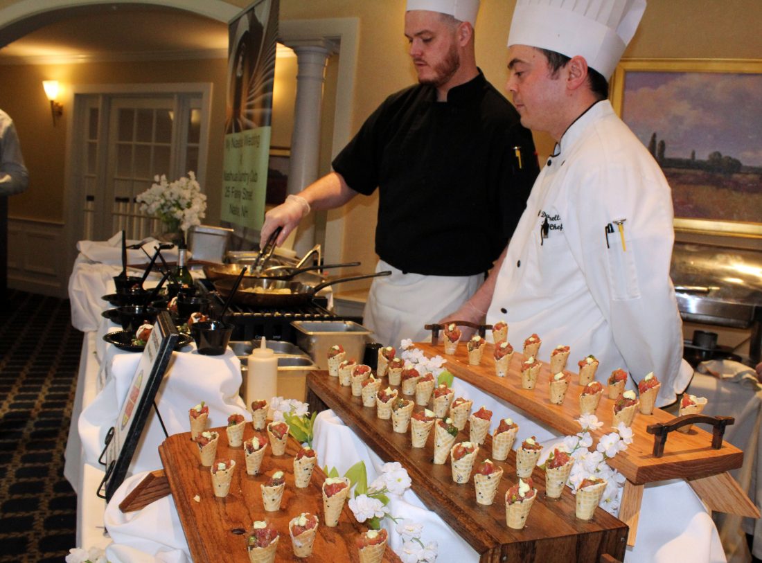 A Foodies’ Dream: Gourmet food, robust auction bidding highlight annual ...